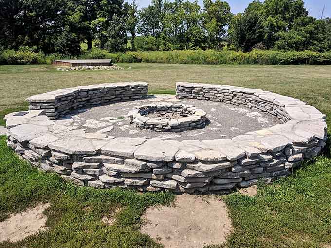 This stone fire pit practically begs for s'mores, ghost stories, and the kind of memories that last a lifetime.