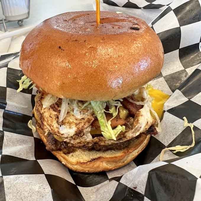 This towering cheeseburger on a bagel proves that sometimes the best innovations happen when tradition gets creative.