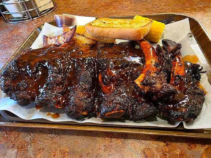 Ribs so tender they practically wave goodbye to the bone, glazed in sauce that deserves its own fan club.