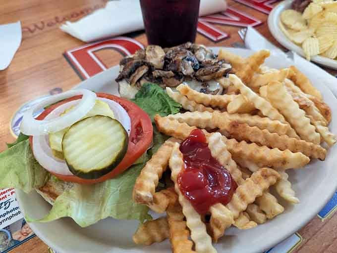 That Swiss burger with waffle fries proves sometimes the classics don't need reinventing, just proper execution.