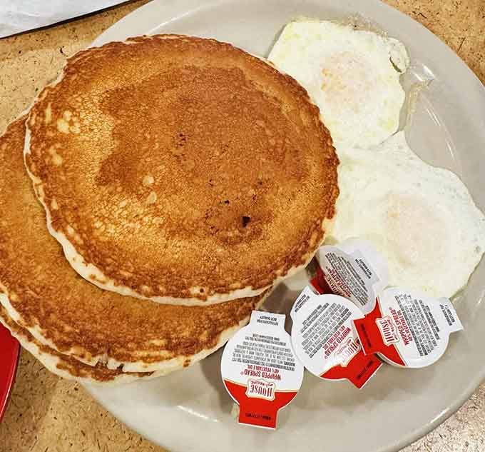 Pancakes so perfectly golden and fluffy, they could make a grown person forget about their low-carb resolution in seconds flat.