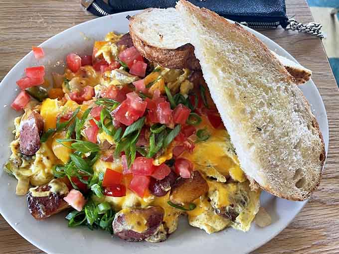 The Polish scramble brings Eastern European comfort to your Michigan morning with hearty potatoes and perfectly cooked eggs.