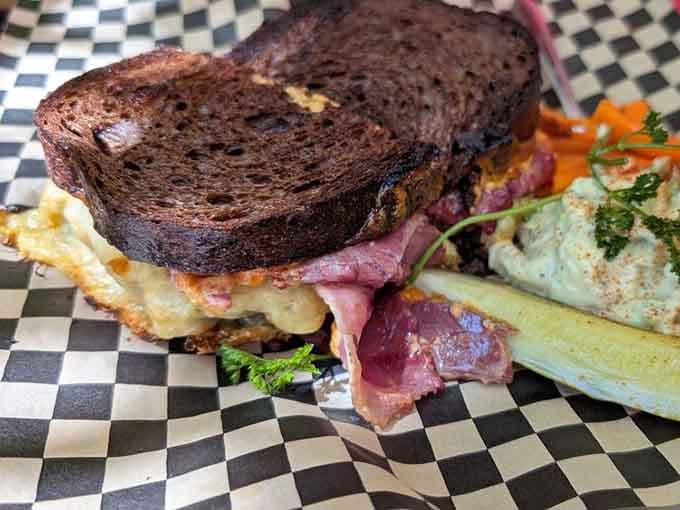 Behold the Reuben that launched a thousand return visits, grilled to absolute perfection on marbled rye.