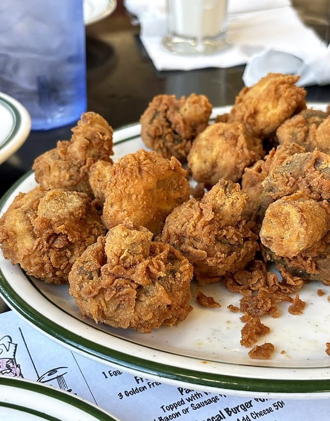 Golden-fried mushrooms that prove sometimes the best things in life come in crispy, bite-sized packages of pure joy.