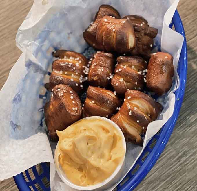 Warm pretzel bites at Halligans arrive golden and salty, perfect for dipping, sharing, and happily disappearing faster than you expected.