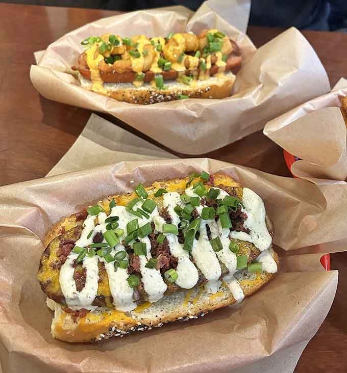 Two hot dogs dressed to impress, proving that toppings can transform a simple frank into edible art.