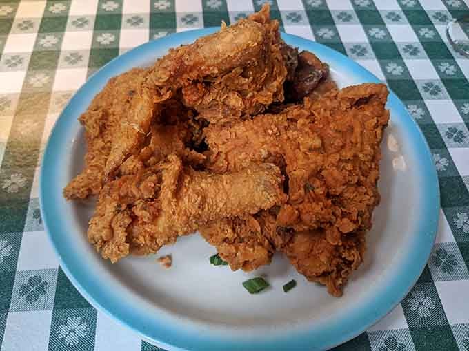 Golden, crispy, and piled high&mdash;this is the fried chicken that's been making believers out of skeptics for generations.