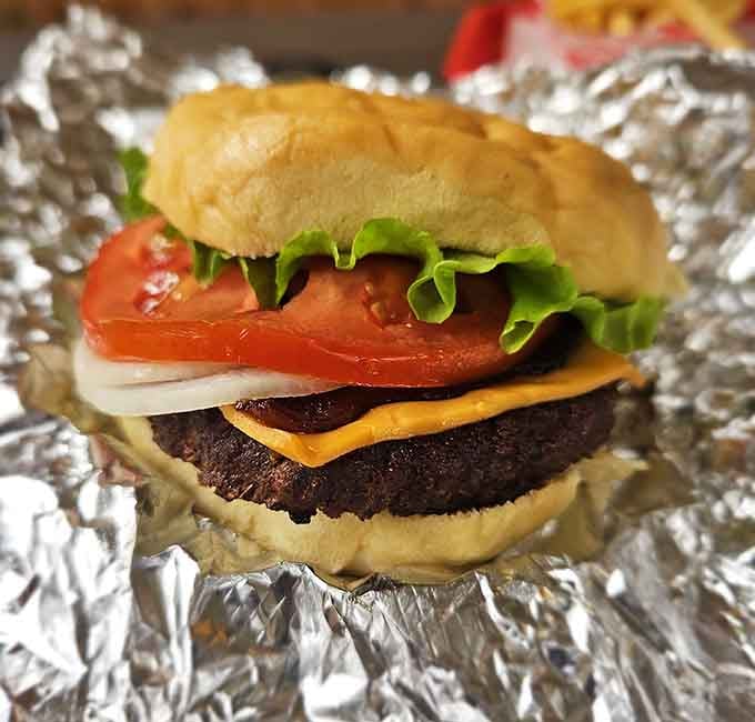Behold the cheeseburger that understands proper cheese-to-patty ratios better than most culinary schools ever will, honestly.