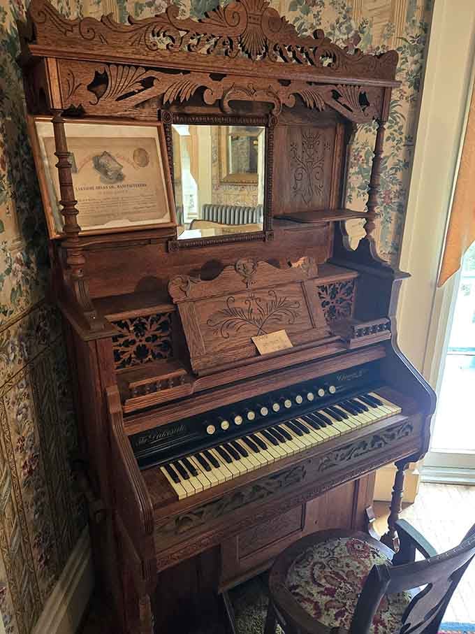 An ornate vintage organ that probably played hymns and lullabies, though some say it occasionally plays itself at night.