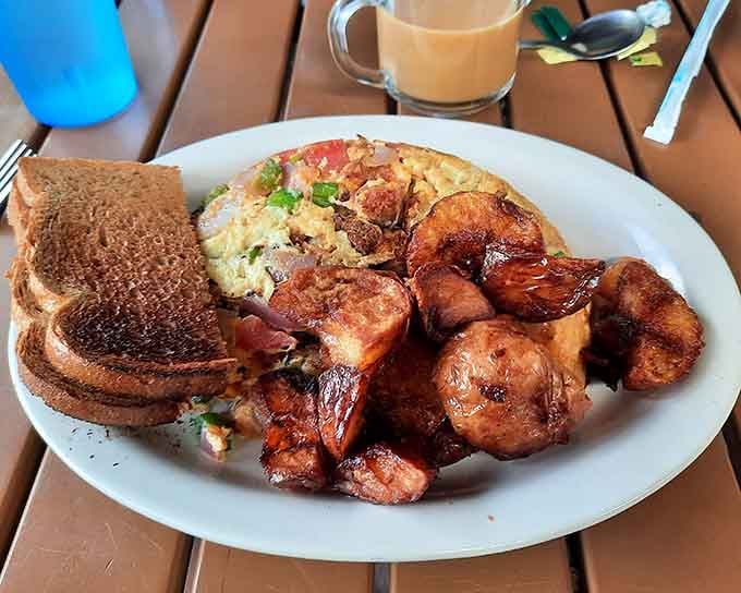 Home fries with actual crispy edges and an omelet that doesn't need a filter to look gorgeous.