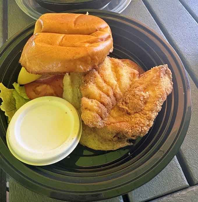 Behold the star of the show: golden-fried grouper so fresh and perfectly crispy it deserves its own fan club.