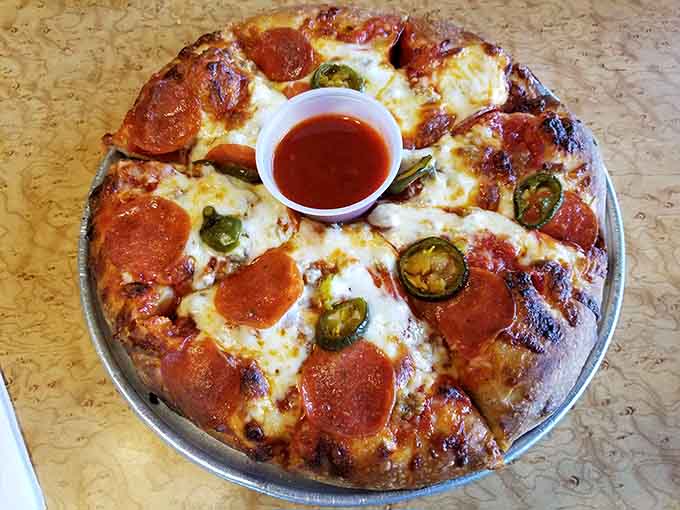 The Electric Chair pizza lives up to its name with jalape&ntilde;os and death row sauce that'll wake you right up.