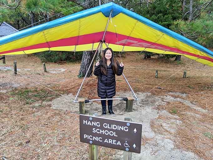 Nothing says "I'm ready to fly" quite like standing beneath a rainbow hang glider at the park's picnic area.