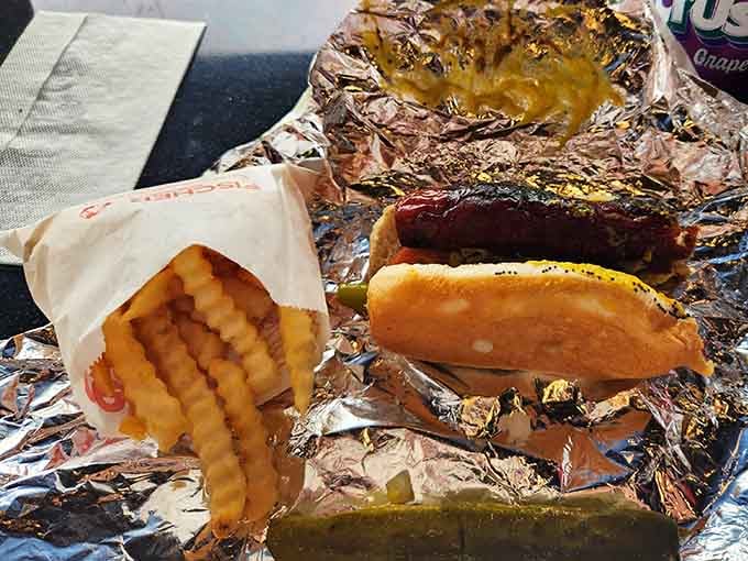 Crinkle fries and a perfectly dressed dog wrapped in foil prove simple pleasures are often the best ones.