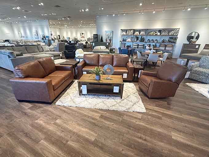 Brown leather sofas arranged like they're having their own conversation, just waiting for you to join in.