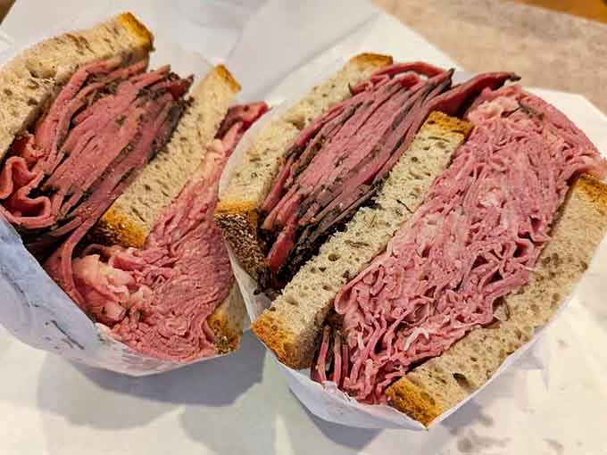 These towering meat monuments make you wonder if structural engineering should be a required deli skill.