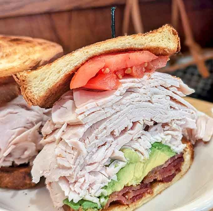 Turkey piled higher than your expectations, proving that sometimes excess is exactly what the doctor ordered.