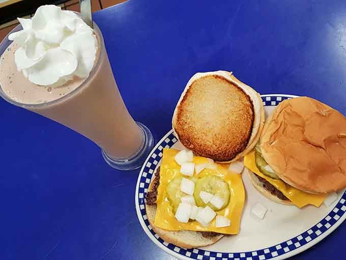 Classic burger, golden bun, and a malted shake topped with whipped cream&mdash;this is what happiness looks like on a plate.