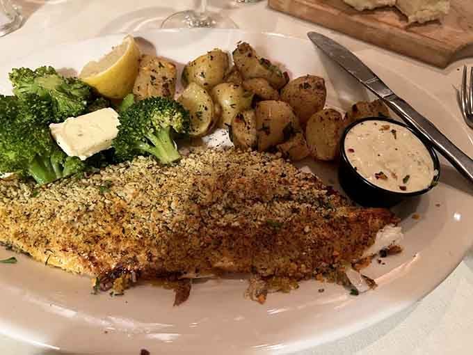 Parmesan-encrusted walleye with roasted potatoes and broccoli: proof that simple preparation lets Great Lakes fish shine brightest.