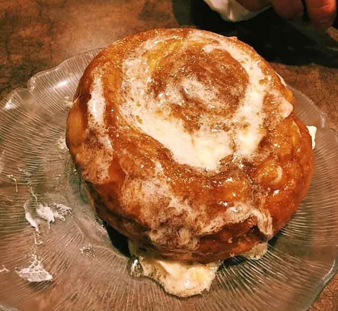 This caramel roll is basically a cinnamon roll that went to finishing school and came back fancy.