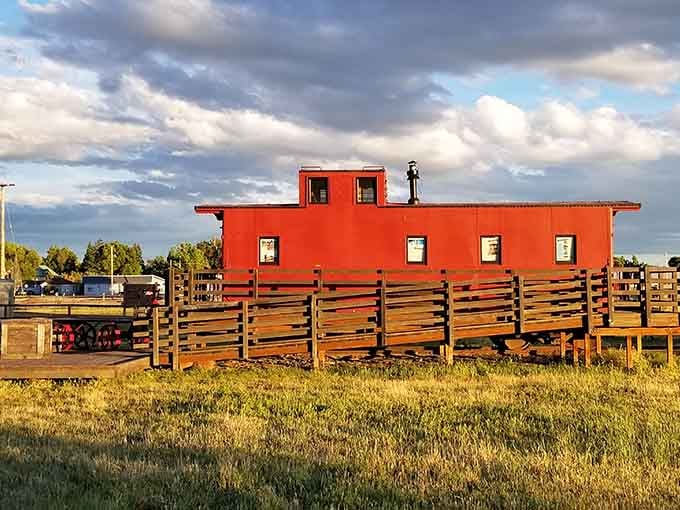 That bright red caboose isn't going anywhere, but it sure makes the OC&E Trail memorable.