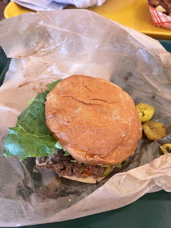 Sometimes perfection comes wrapped in grease-stained paper with pickles peeking out like they're photobombing your lunch in the best way.