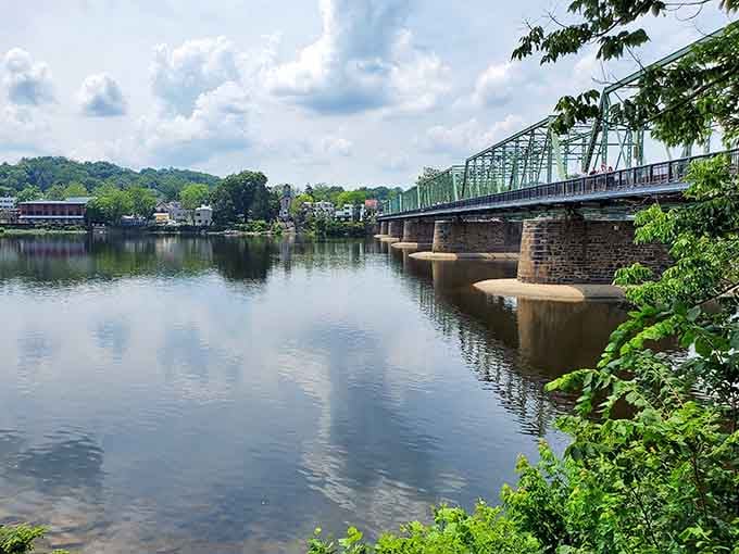 The Delaware River bridge connects two states and countless stories, spanning water that's witnessed centuries of American history flowing beneath.