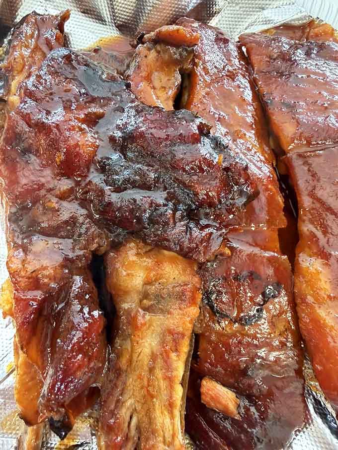 These ribs have that gorgeous bark and smoke ring that make barbecue pilgrims travel across state lines willingly.