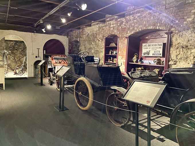 Early automobiles lined up like mechanical aristocrats, each one fancier than anything in your driveway today.
