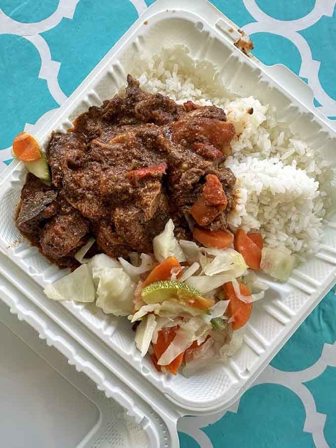 Goat stew with rice that'll make you forget every overpriced meal you've ever regretted ordering elsewhere.