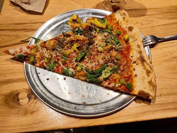 Even the vegan pizza looks this good, proving plants can party just as hard as pepperoni ever could.