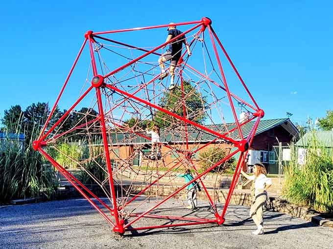 Kids conquering this geometric climbing structure prove that playgrounds have evolved since the metal slides of our youth.