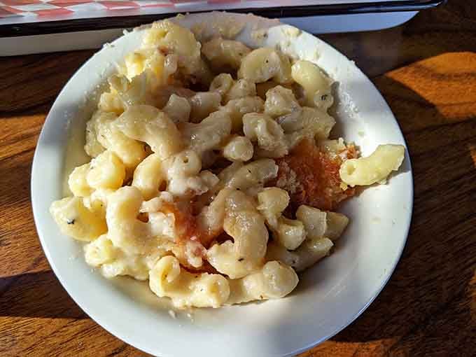 Behold the mac and cheese that launched a thousand road trips, creamy and golden as a Kentucky sunset.