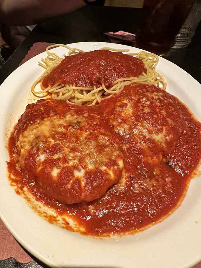 Chicken Parmigiana so generous it makes your nonna's portions look like appetizers at a fancy restaurant.