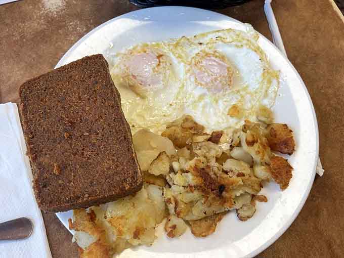 Two eggs, home fries, and toast: the holy trinity of breakfast that never goes out of style.