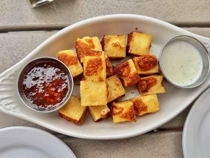 Golden, crispy cheese curds proving that Minnesota's greatest contribution to cuisine deserves all the recognition it gets.