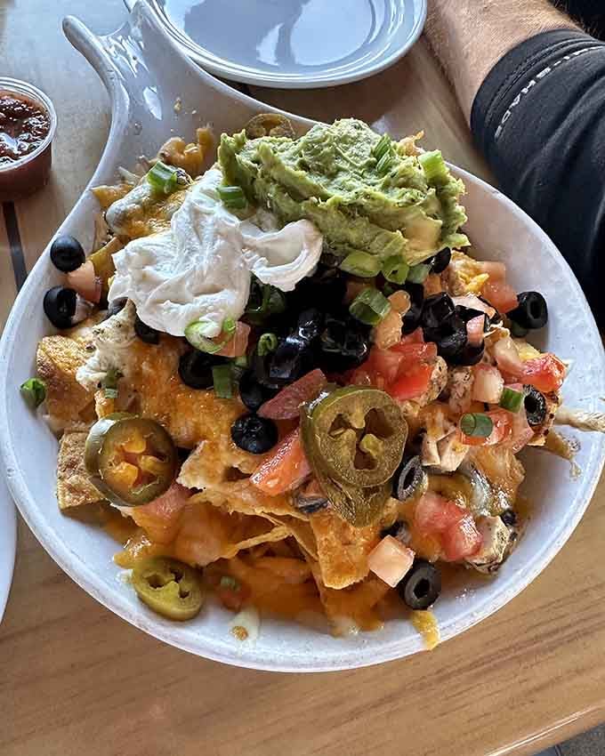 Behold the nacho mountain that could feed a small village or one very determined person with excellent priorities.