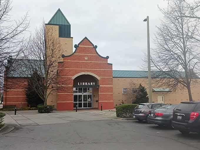 The library looks like it belongs in a Flemish painting, making overdue book fines feel almost charming.