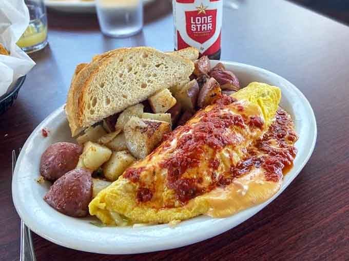 This omelet is so generously stuffed, it's practically bursting with pride and probably enough protein for two days.