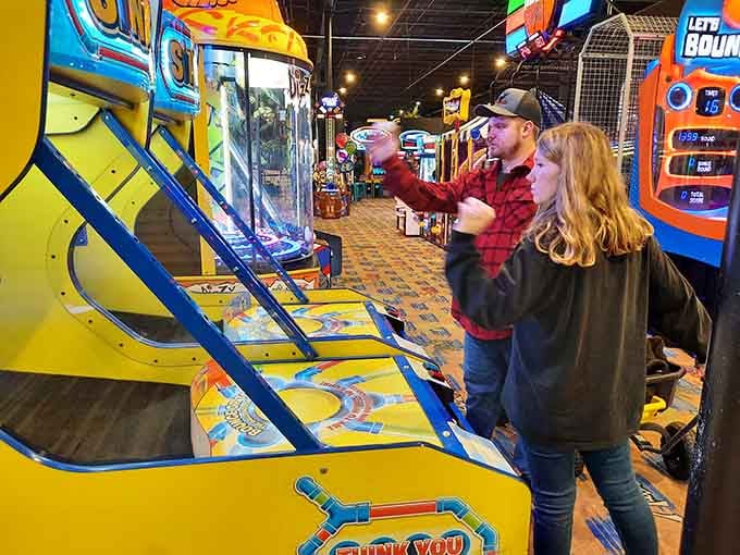 When arcade games require this level of concentration, you know the competition is about to get hilariously serious between family members.