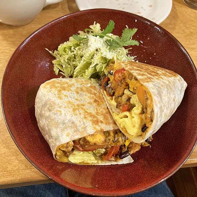 The Marigold Benedict Burrito proves that sometimes the best ideas come from breaking all the traditional breakfast rules with delicious confidence.