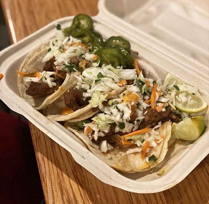 Tacos loaded with tender pork and chicken that'll make you forget tortillas ever had boring fillings.