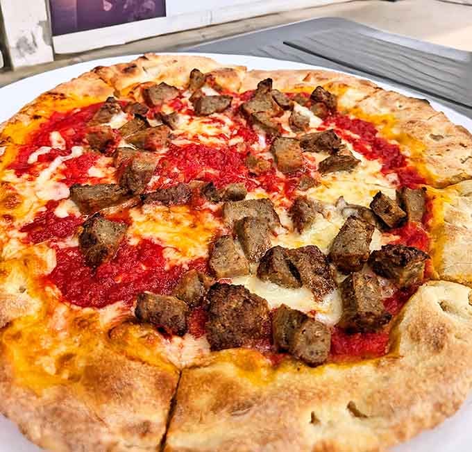 Half sausage, half plain proves that sometimes the best relationships are built on compromise and excellent pizza crust.