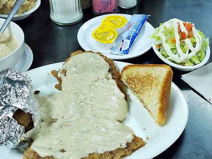 Behold the chicken fried steak that launched a thousand road trips and defeated a thousand appetites.