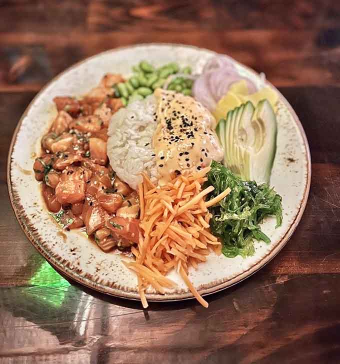 This poke bowl brings Hawaiian sunshine to your table, one perfectly arranged bite at a time.