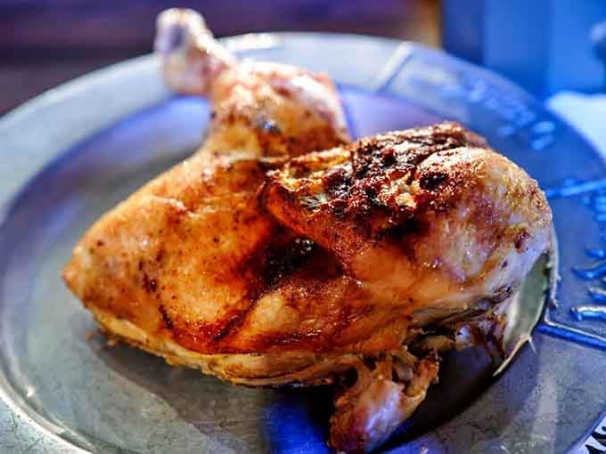 That roasted chicken leg quarter glistens with medieval authenticity, ready to be devoured like a true knight.