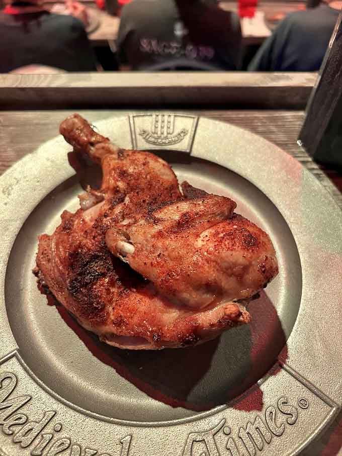 Half a roasted chicken that you attack with your bare hands, because apparently forks weren't invented until 1492.