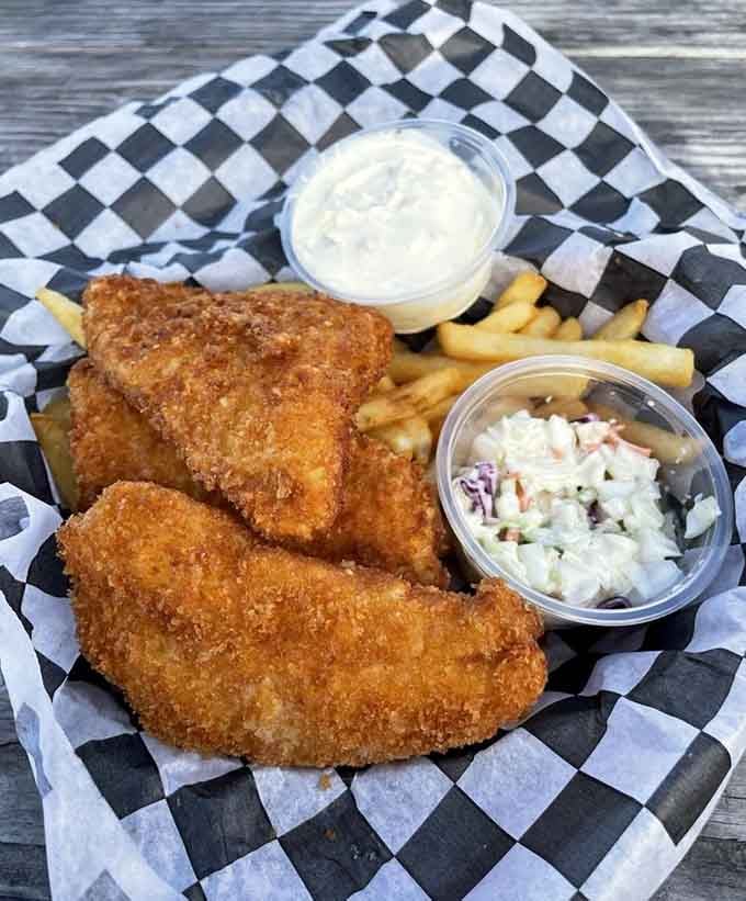 Golden, crispy perfection served in a checkered basket because sometimes the classics don't need improvement.