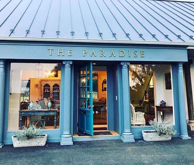 The Paradise storefront glows like a beacon for anyone who believes that one person's antique is another person's perfect living room centerpiece.