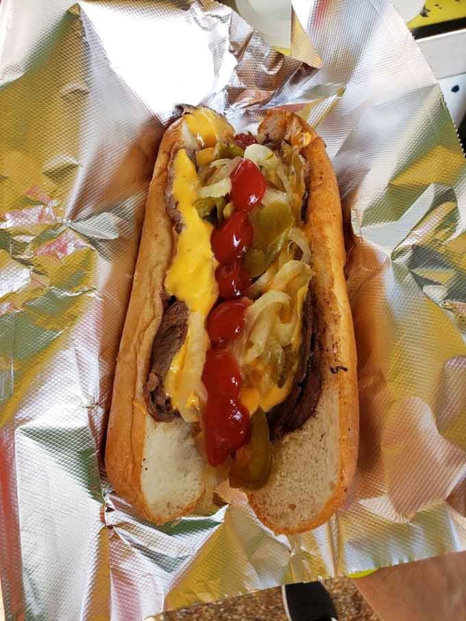 Onions, peppers, ketchup, and melted cheese create a symphony that would make any conductor jealous of your lunch.